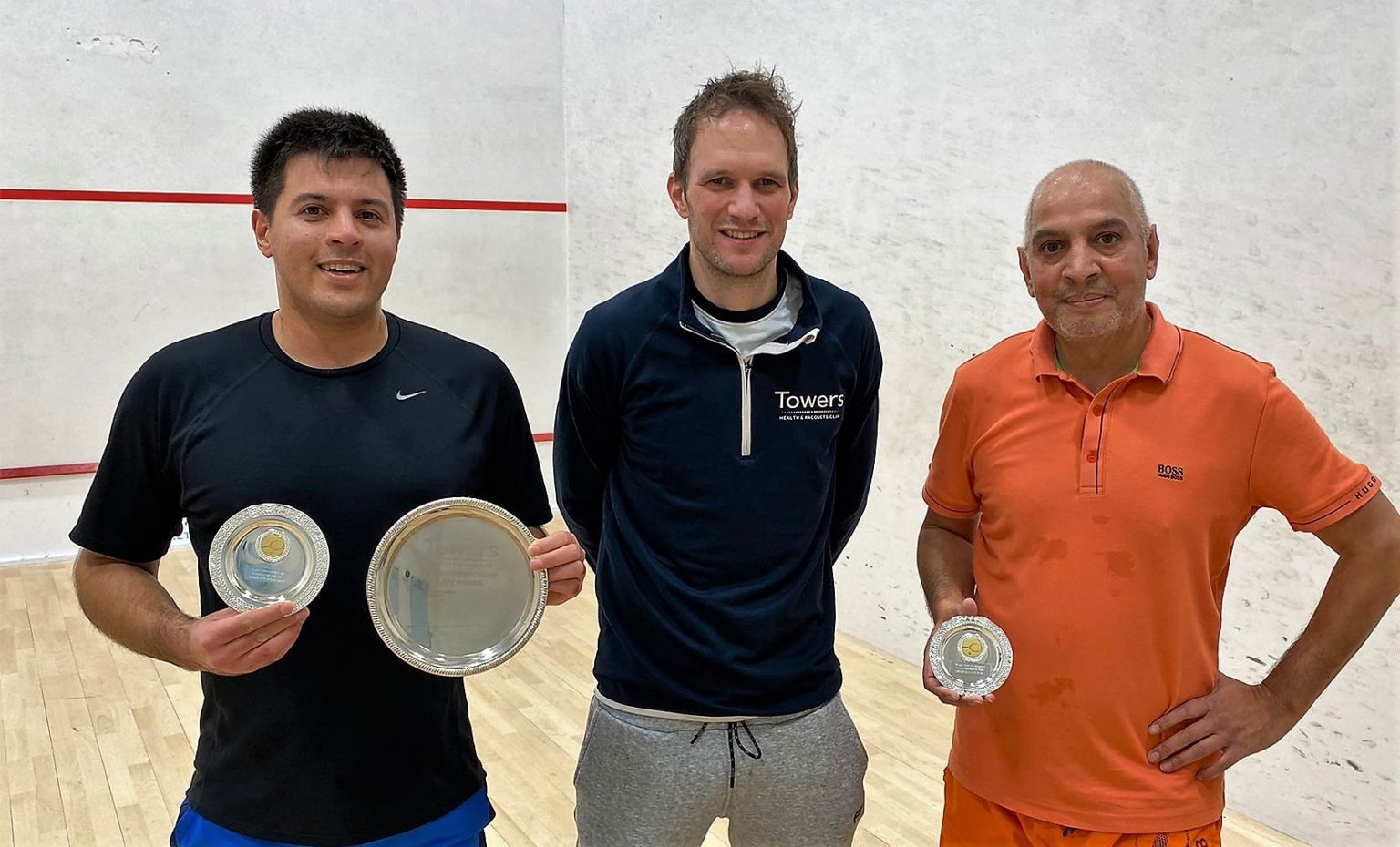 Davies and Olphin take Squash Club Championship Titles - Club Towers